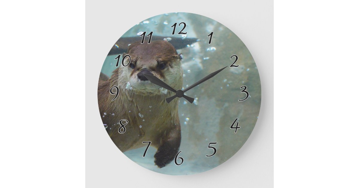 A cute Brown otter swimming in a clear blue pool Large Clock | Zazzle