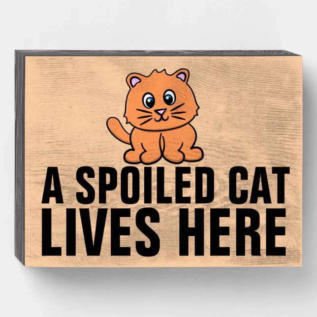 A SPOILED CAT LIVES HERE WOOD SIGN | Zazzle