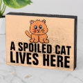 A SPOILED CAT LIVES HERE WOOD SIGN | Zazzle