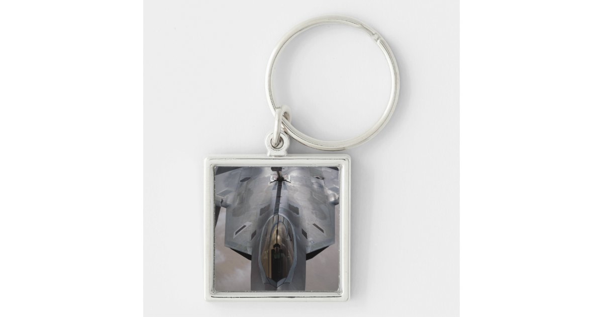 A US Air Force F-22 Raptor is refueled Keychain | Zazzle