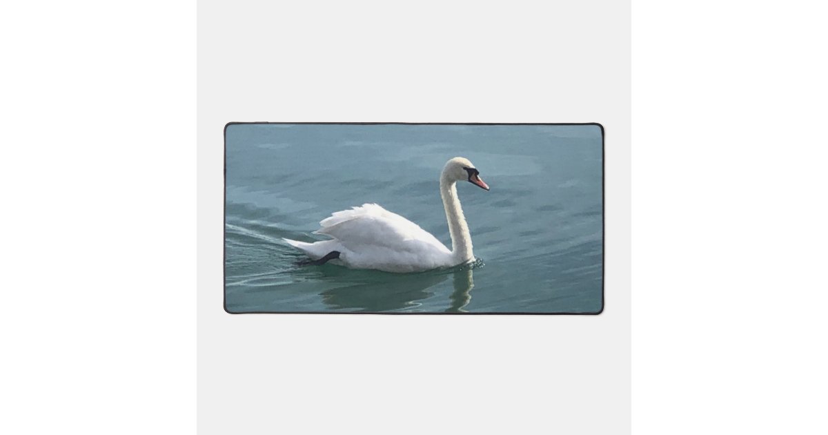 An Graceful Swan Gliding on the Water Desk Mat | Zazzle