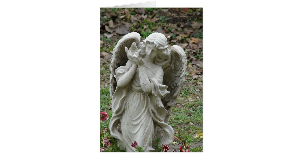 Angel Holding a Dove Statue | Zazzle