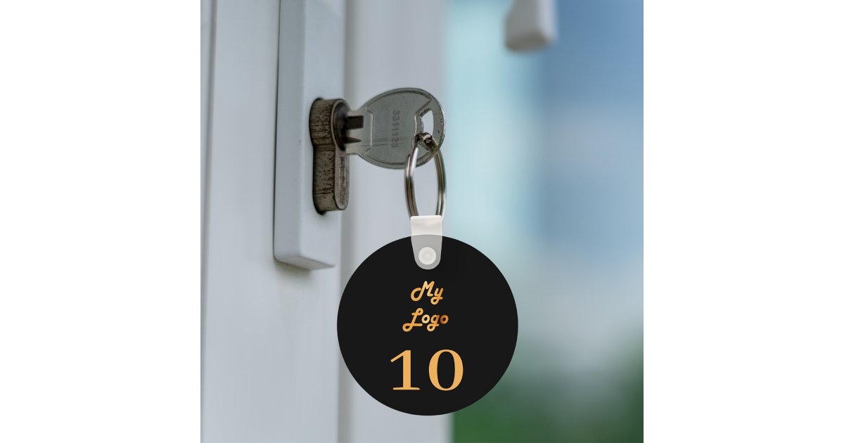 Black gold custom logo rental unit keychain | Zazzle