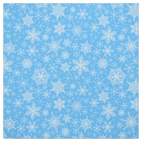 Winter snowflakes pattern on blue fabric | Zazzle
