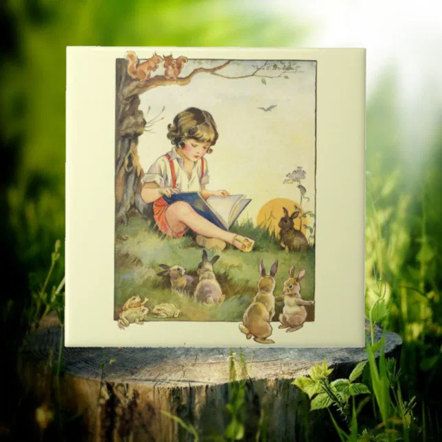 Boy reading under tree with rabbits ceramic tile | Zazzle