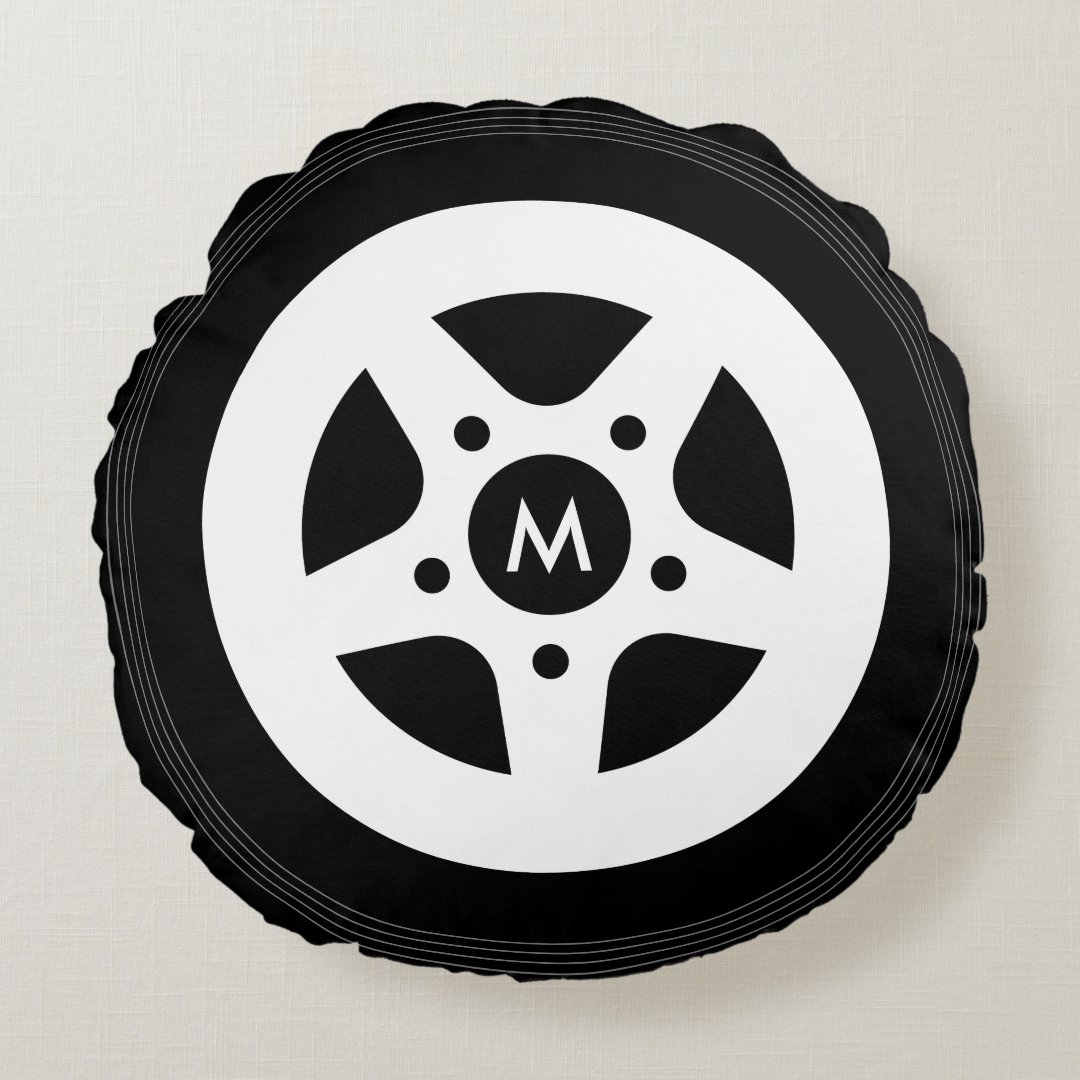 Car wheel throw pillow with black tires and rims | Zazzle