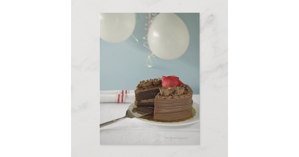 Chocolate cake with missing slice on table, postcard | Zazzle