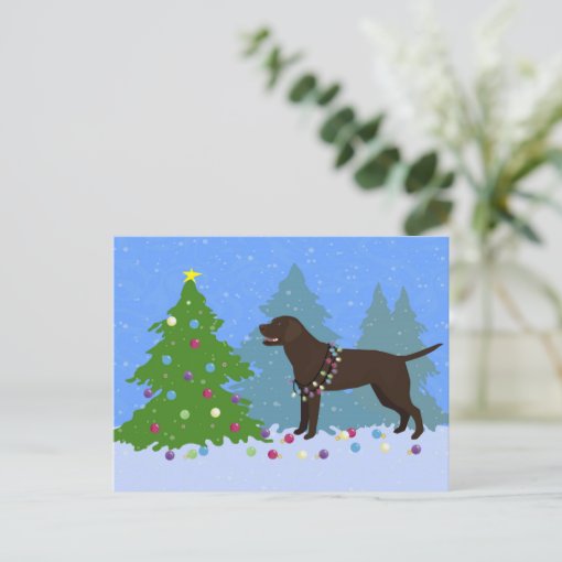 Chocolate Lab in Forest Decorating Christmas Tree Holiday Postcard | Zazzle