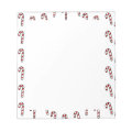 Christmas candy cane on white notepad | Zazzle