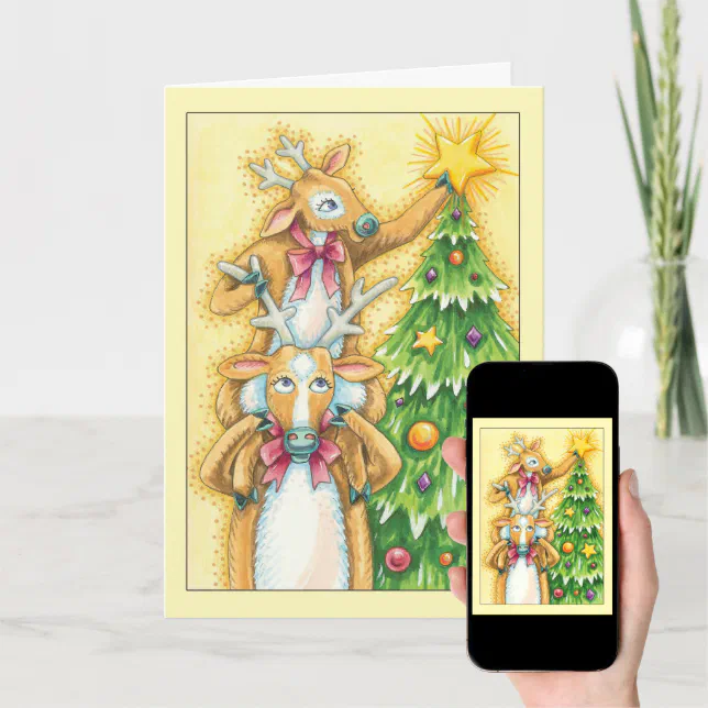Christmas Card With Cute Pair Of Reindeer Putting | Zazzle