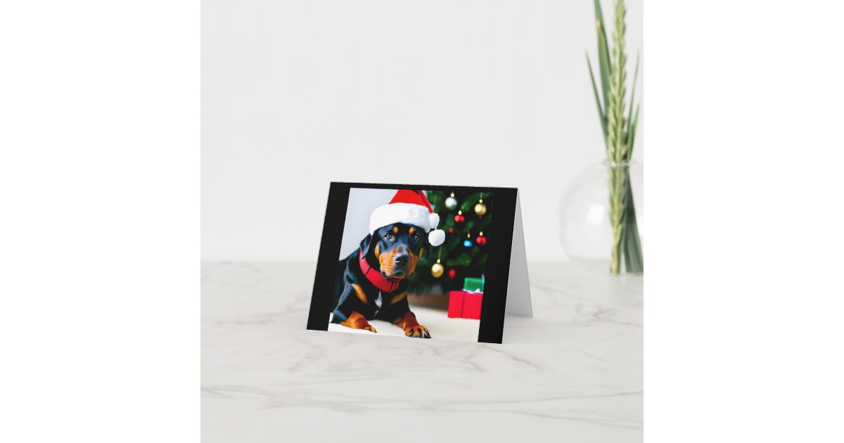 Christmas card with Rottweiler wearing Santa hat | Zazzle