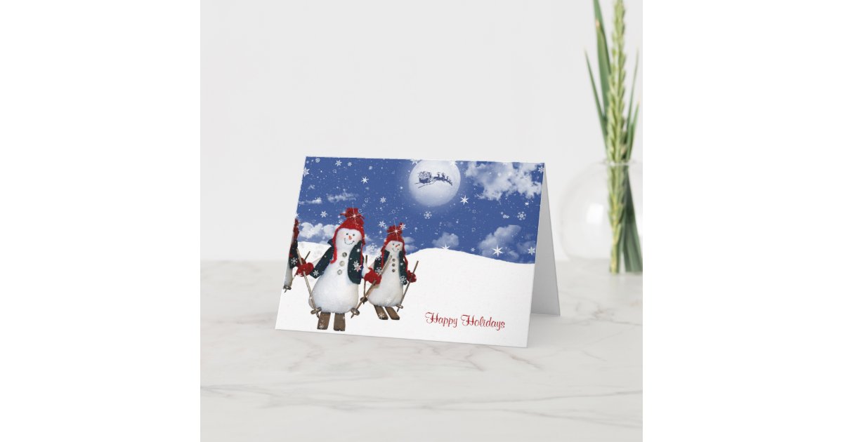 Christmas snowmen skiing holiday card | Zazzle