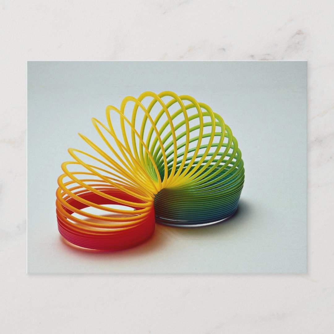 Colorful Rainbow slinky toy for kids Postcard | Zazzle