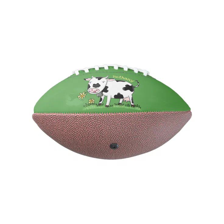 Cute cow in green field cartoon illustration football | Zazzle