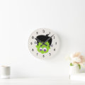 Cute Green Frankenstein Monster face Halloween Round Clock | Zazzle