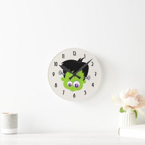 Cute Green Frankenstein Monster face Halloween Round Clock | Zazzle
