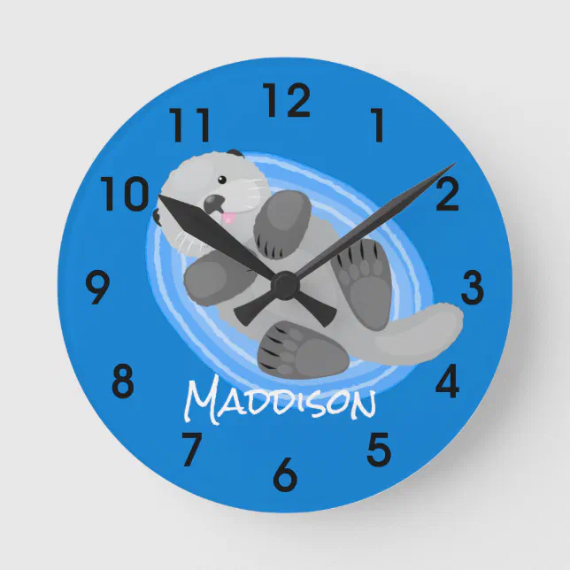Cute happy sea otter blue cartoon illustration round clock | Zazzle