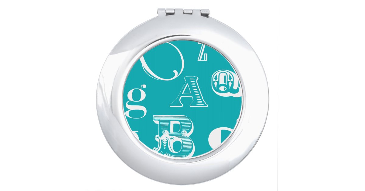 Decorative Letters on Blue Background Vanity Mirror | Zazzle