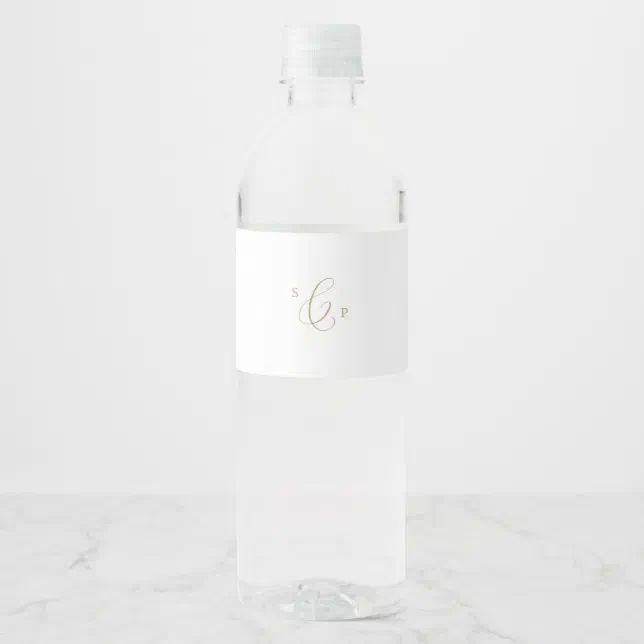Delicate Gold Calligraphy Monogram Wedding Water Bottle Label | Zazzle