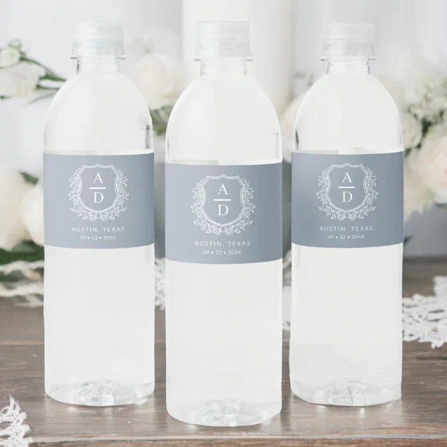 Dusty Blue Monogram Wedding Floral Crest Water Bottle Label | Zazzle