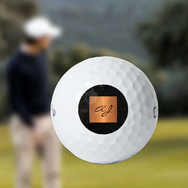 Elegant gold black monogram personalized golf balls | Zazzle