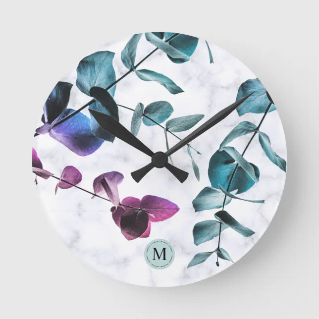 Elegant white marble eucalyptus foliage monogram round clock | Zazzle