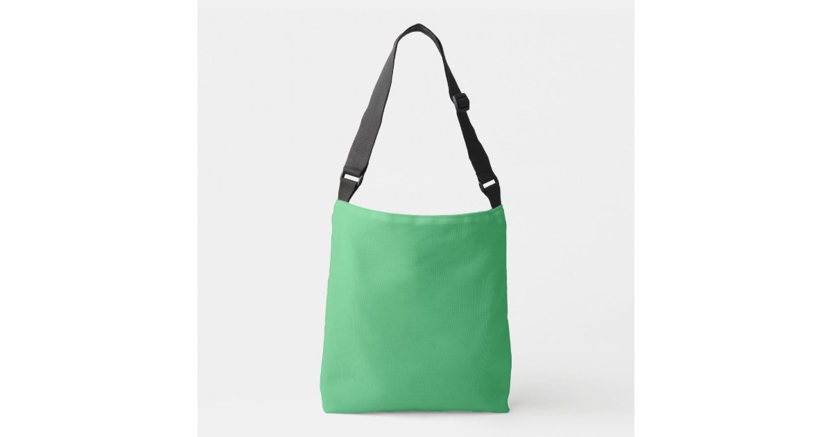 Emerald hex code 50c878 crossbody bag | Zazzle