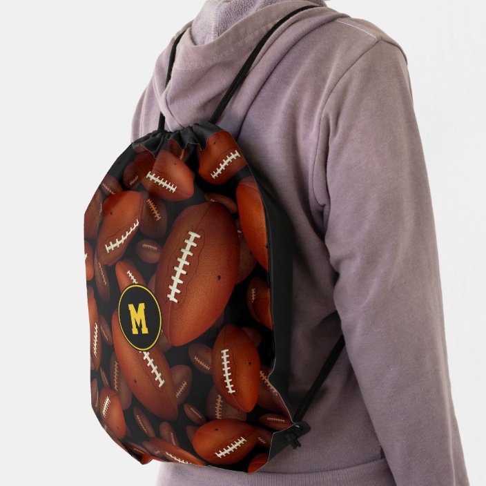 footballs pattern monogrammed sports drawstring bag | Zazzle.com