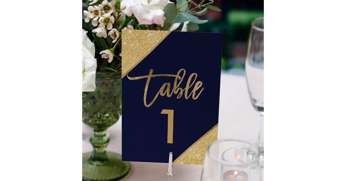 Gold glitter script navy blue table number | Zazzle