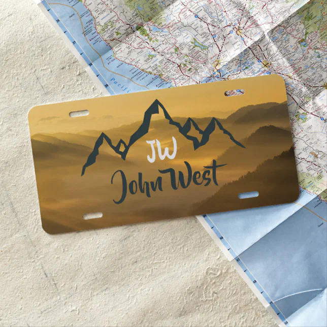 Gold sunrise personalizable mountains monogram license plate | Zazzle