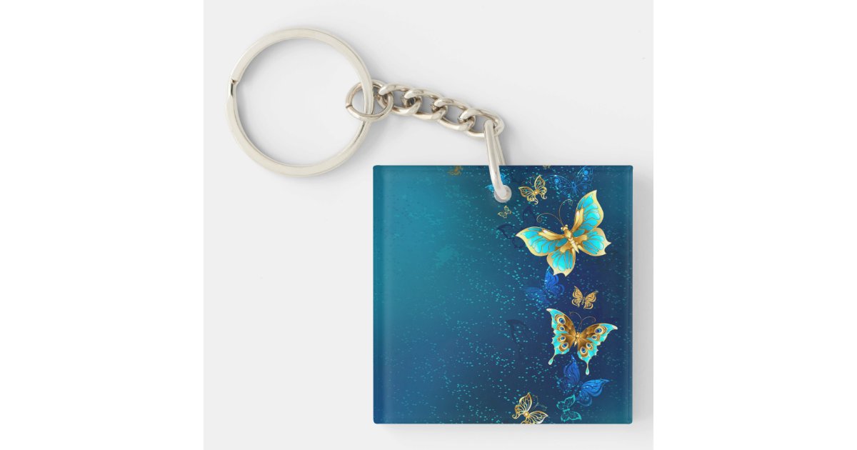 Golden Butterflies on a Blue Background Keychain | Zazzle