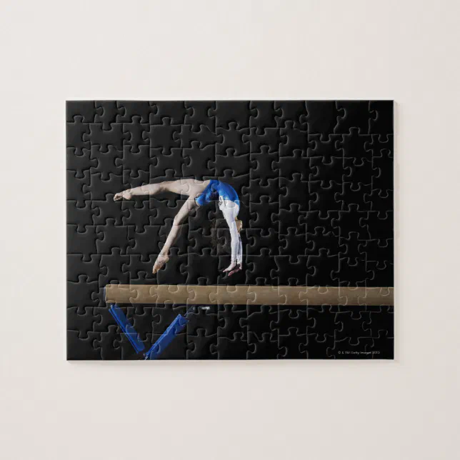 Gymnast (9-10) flipping on balance beam, side jigsaw puzzle | Zazzle