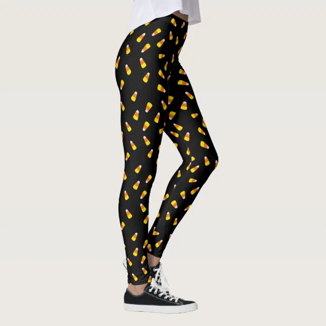 Hallowe'en black background candy corn leggings | Zazzle