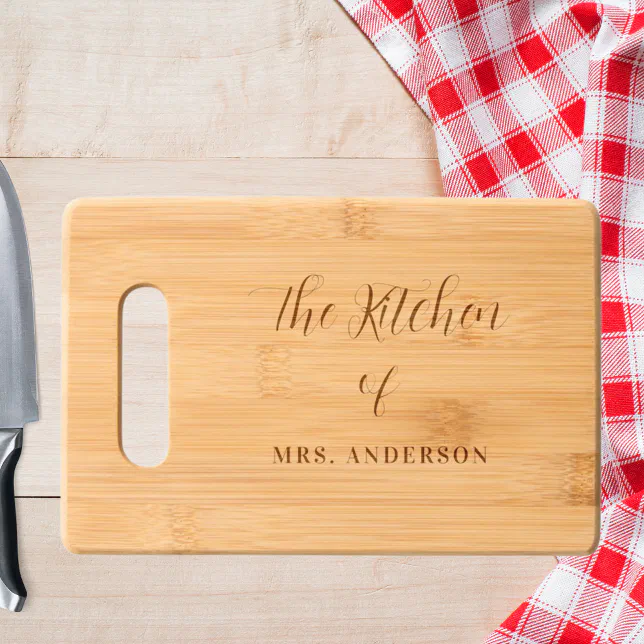 Kitchen of name script engraved cutting board | Zazzle
