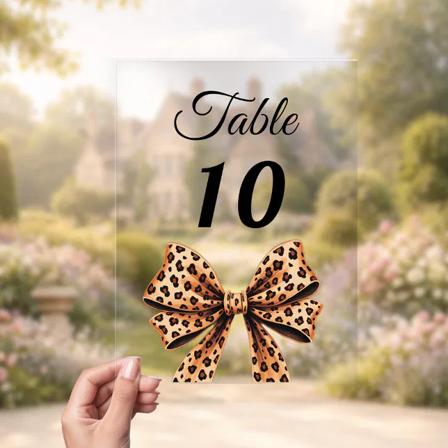 Leopard bow acrylic table number sign | Zazzle