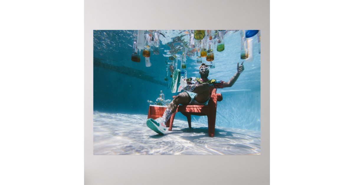 Man sitting on chair underwater with floating bott poster | Zazzle