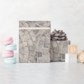 Manhole cover and cobblestone road wrapping paper | Zazzle