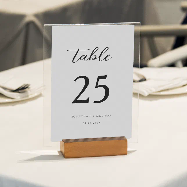 Modern Elegant Black Calligraphy Script Wedding Table Number | Zazzle