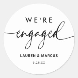 Modern Minimalist Script We're Engaged Classic Round Sticker | Zazzle