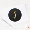 Monogram J gold-colored on black background Classic Round Sticker | Zazzle