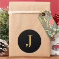 Monogram J gold-colored on black background Classic Round Sticker | Zazzle