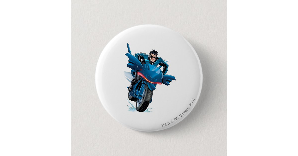 Nightwing rides bike pinback button | Zazzle