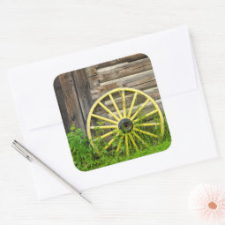 Old wagon wheel in historic old gold town square sticker | Zazzle