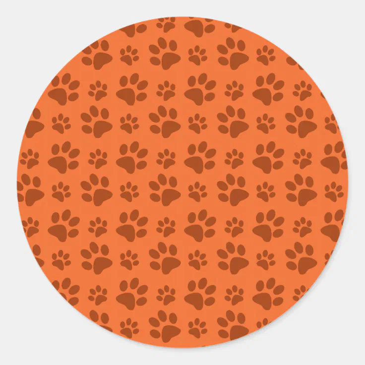 Orange dog paw print pattern classic round sticker | Zazzle