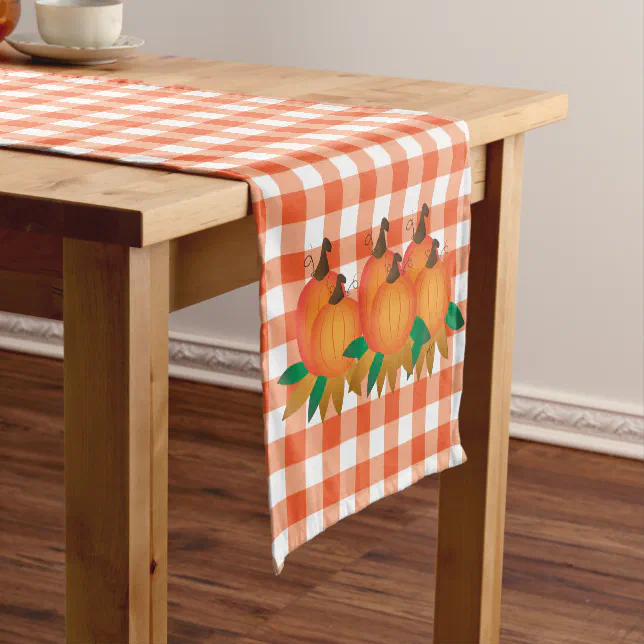 Orange Gingham pattern and pumpkins table runner | Zazzle