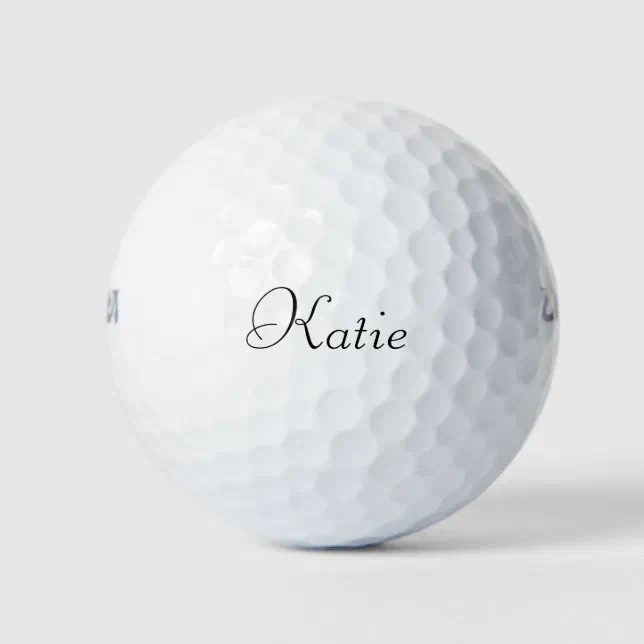 Personalized name black text, cursive font golf balls | Zazzle