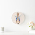 Peter the Rabbit with Beige background Round Clock | Zazzle