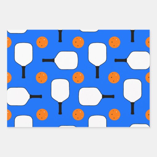 Pickleball Paddles, Orange Pickleball Balls, Blue Wrapping Paper Sheets ...