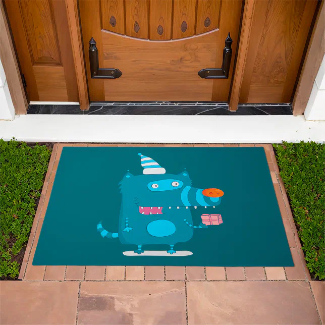 Playful Blue Cartoon Monster with Party Hat Doormat | Zazzle