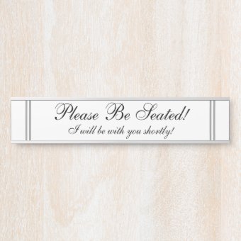 "Please Be Seated!" Door Sign | Zazzle